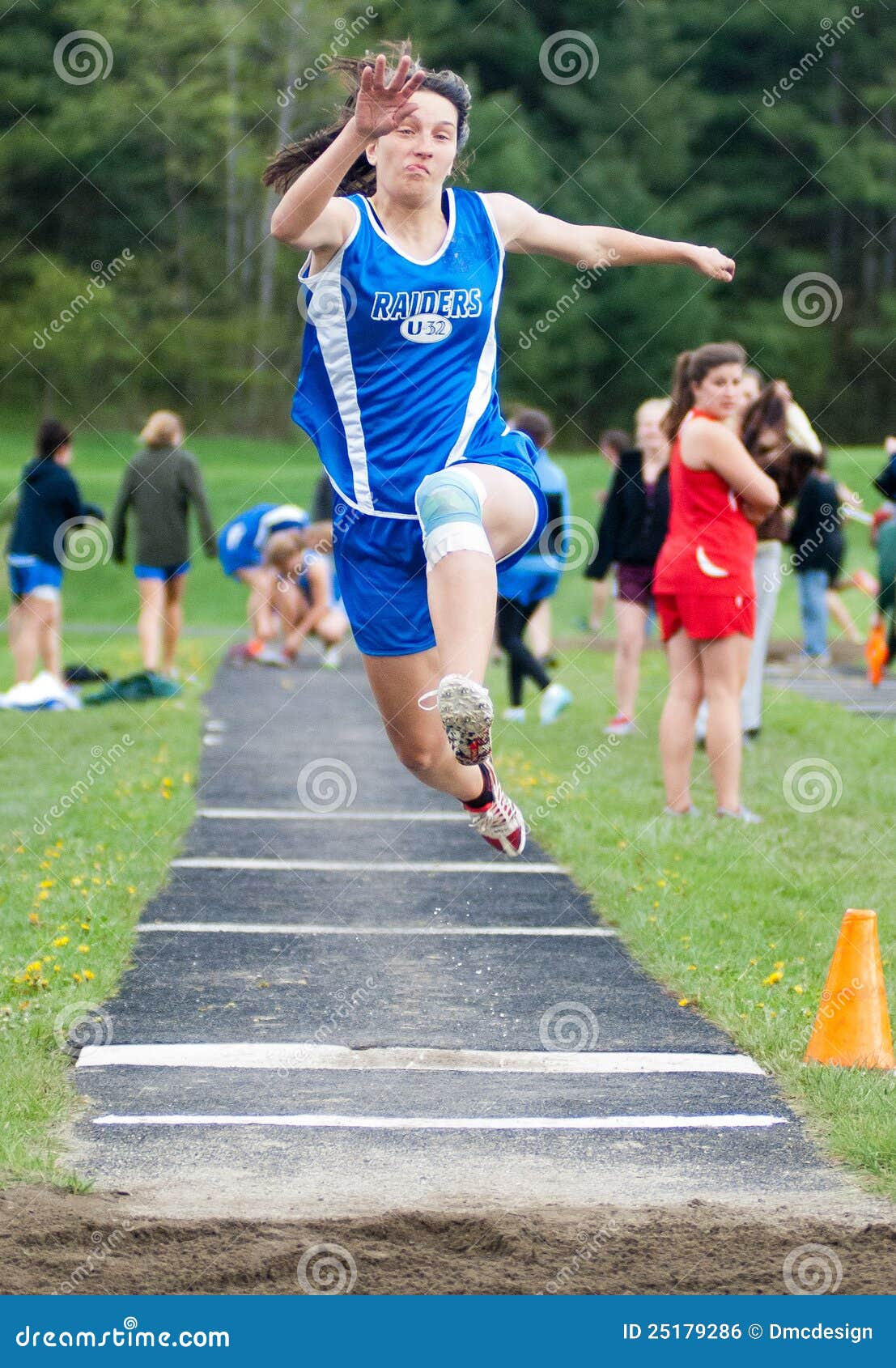 High School Track Long Jump Editorial Photo - Image of athlete, hair ...
