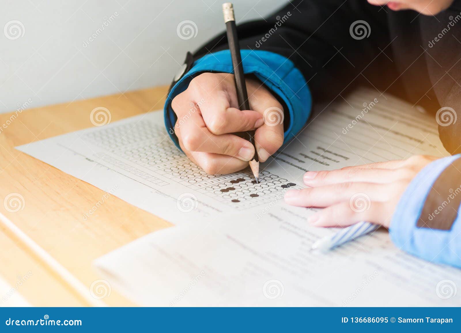 High School or University Student Hands Taking Exams, Writing ...