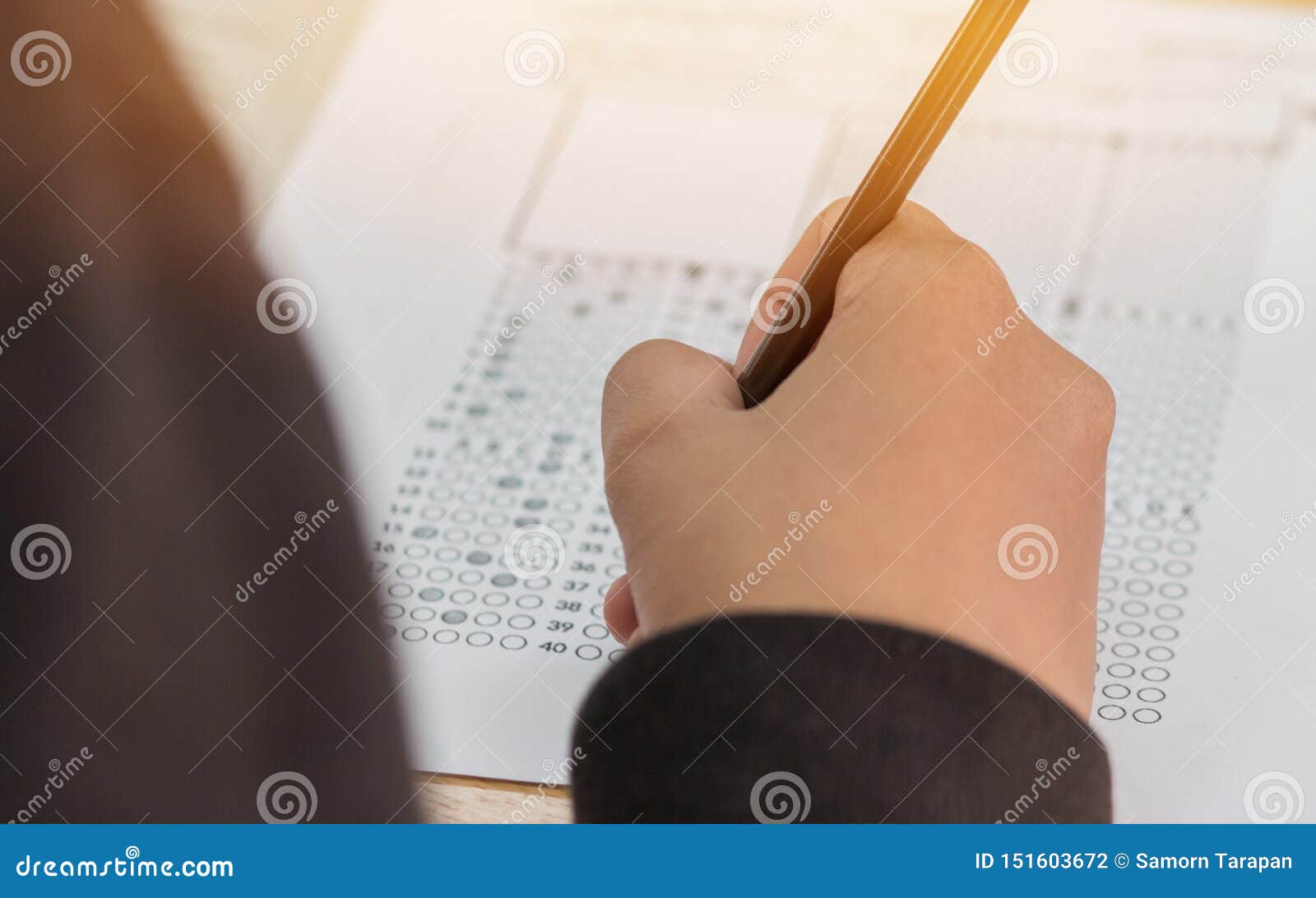 High School or University Student Hands Taking Exams, Writing ...