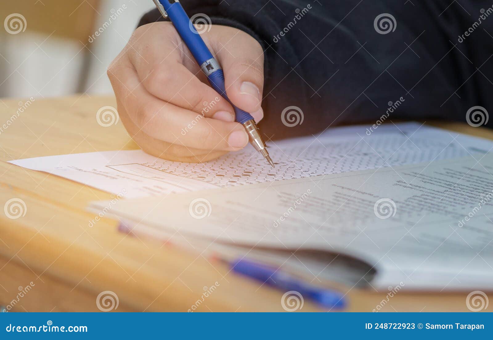 High School or University Student Hands Taking Exams, Writing ...