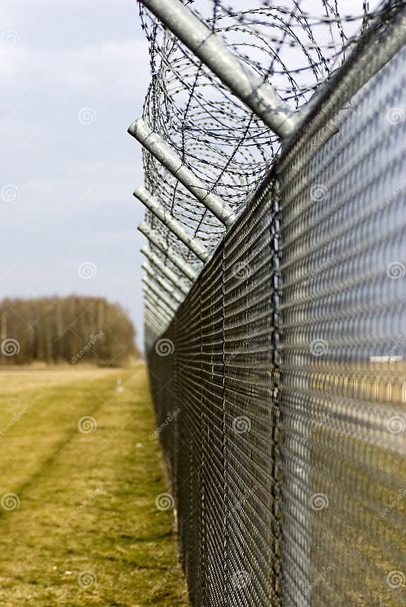 High security fence stock image. Image of barb, high - 13512569