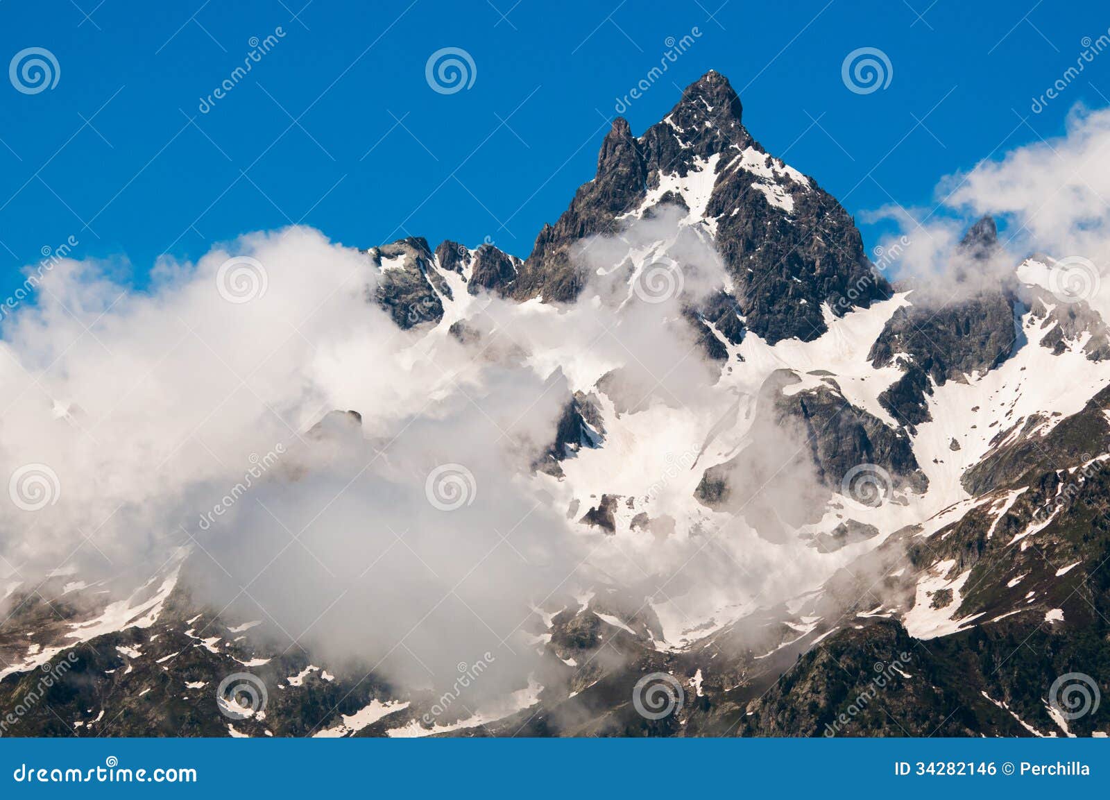 High, Snow Covered Mountain Peak Stock Photo - Image of snow, alps ...