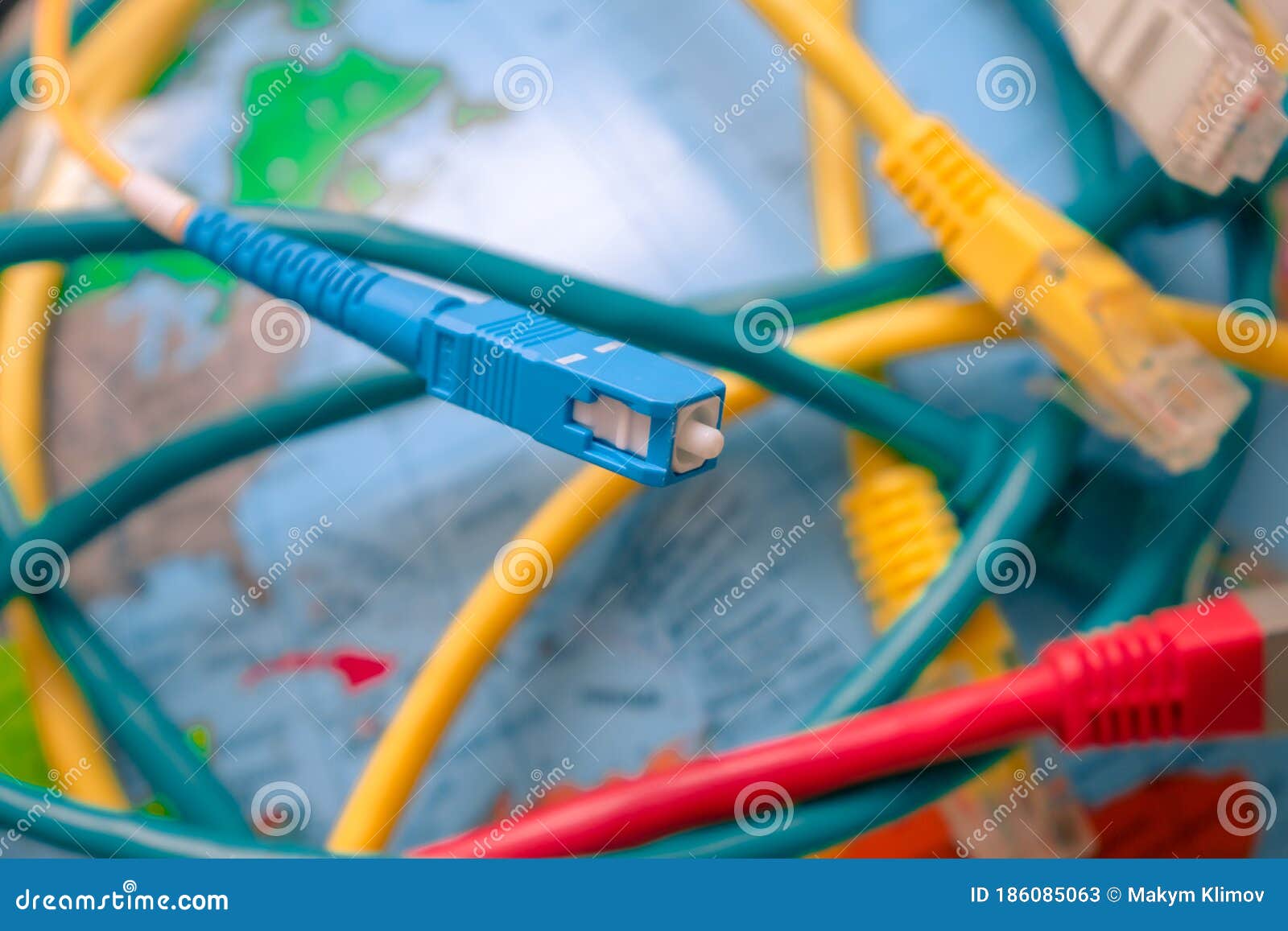 High-speed Cable. Fiber Optic Patch Cord is Close-up on a Background of ...