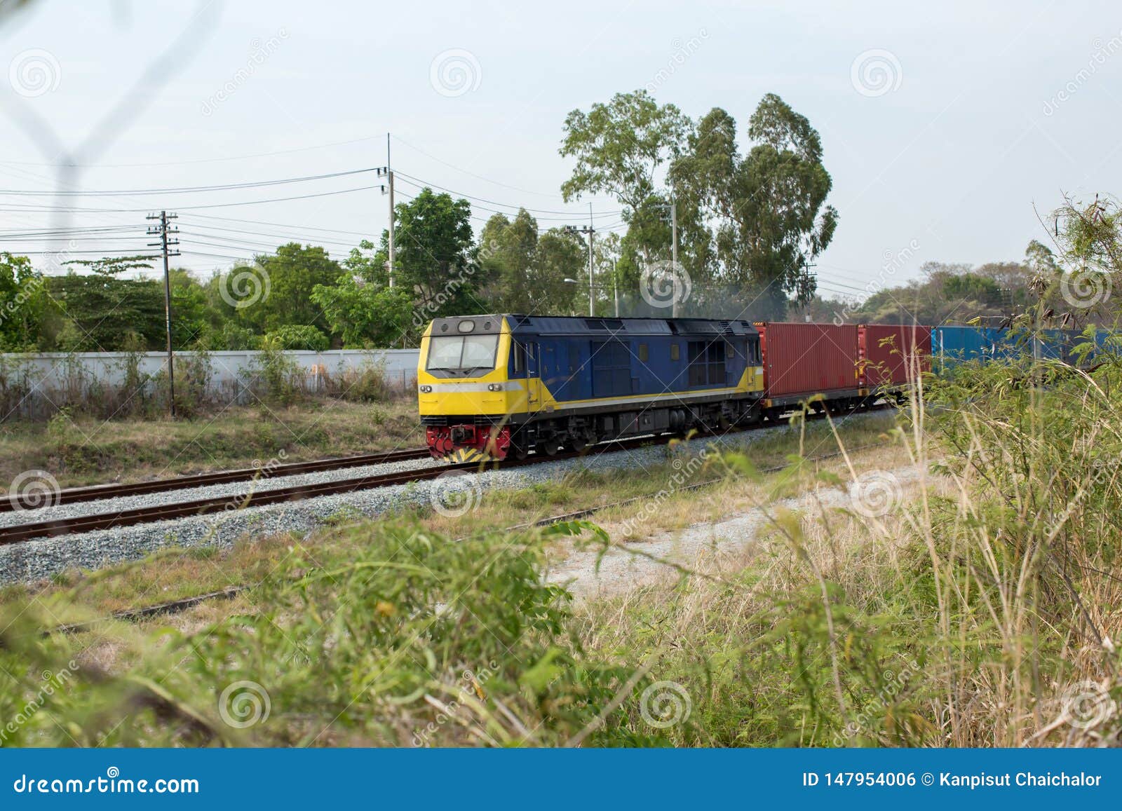 High Speed Electric Train. Cargo Train Platform with Freight Train ...