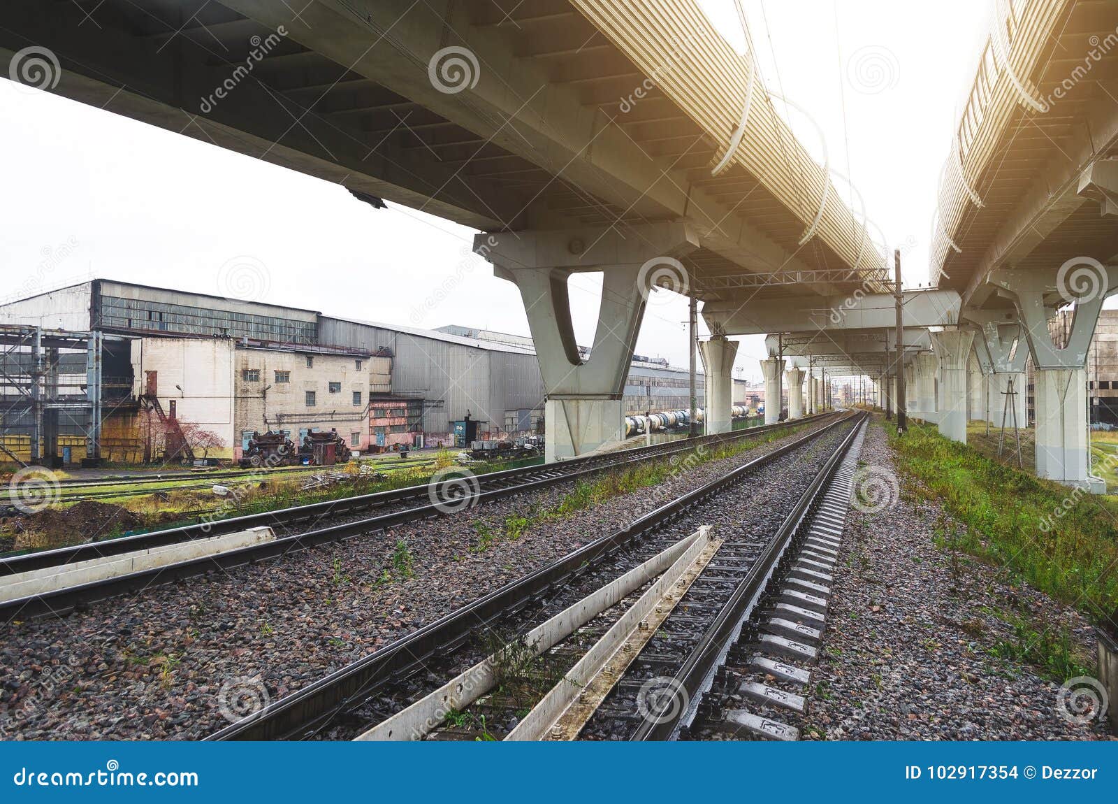 High-speed Highway on High Pillars at the Bottom of the Railway. Stock ...