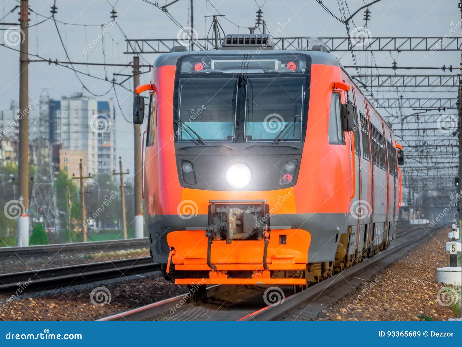 High-speed Red Passenger Train Rushing through the Railway. Stock Image ...
