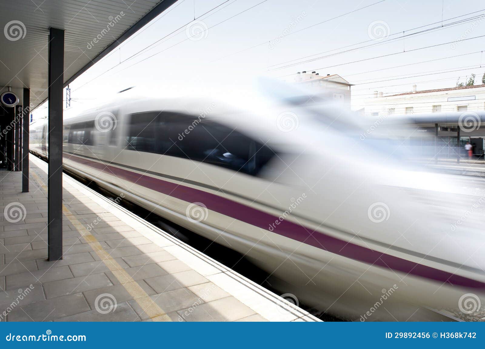 High Speed Train in Movement on a Railway Station Stock Photo - Image ...