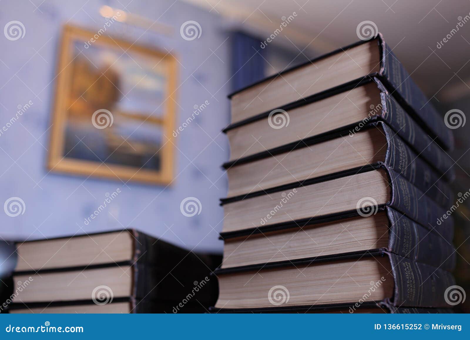 High Stack of Books on the Desk in Library Stock Photo - Image of ...