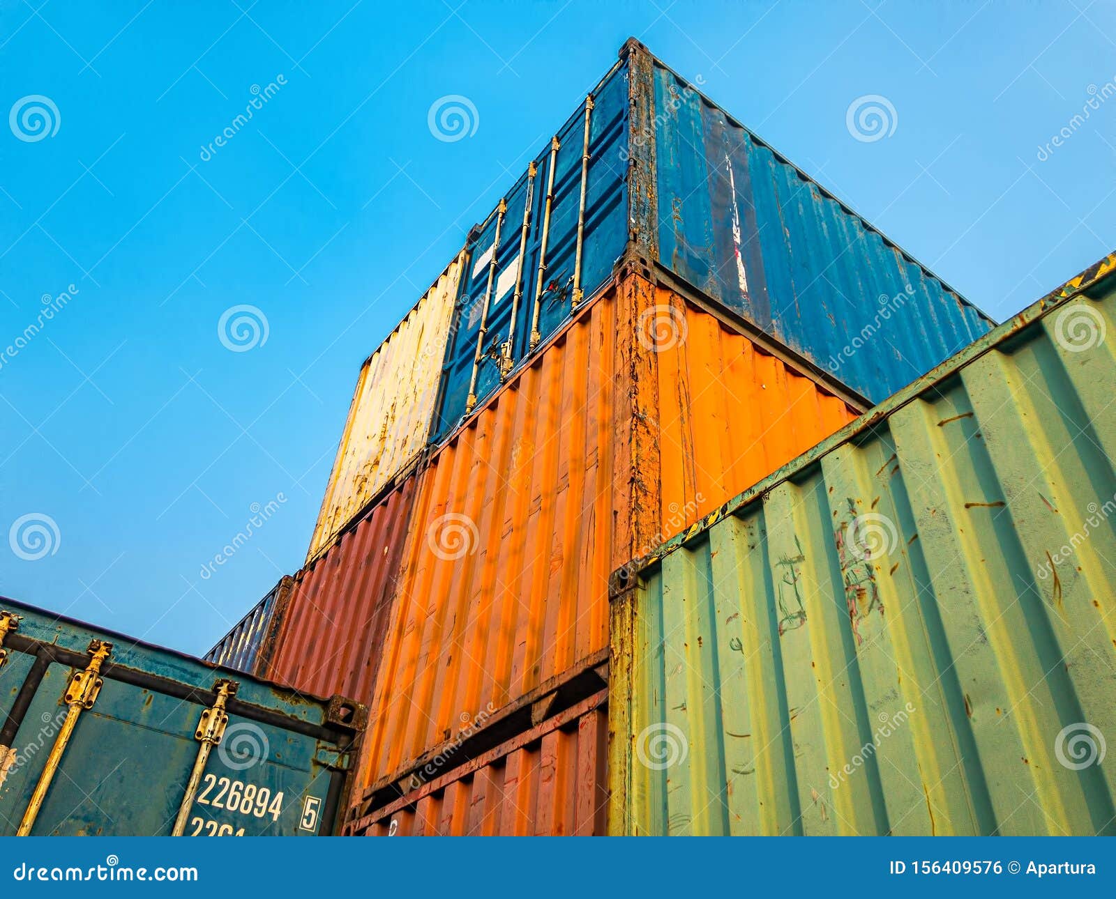 High Stack Towering Containers Box Up To The Blue Sky In Logistic ...