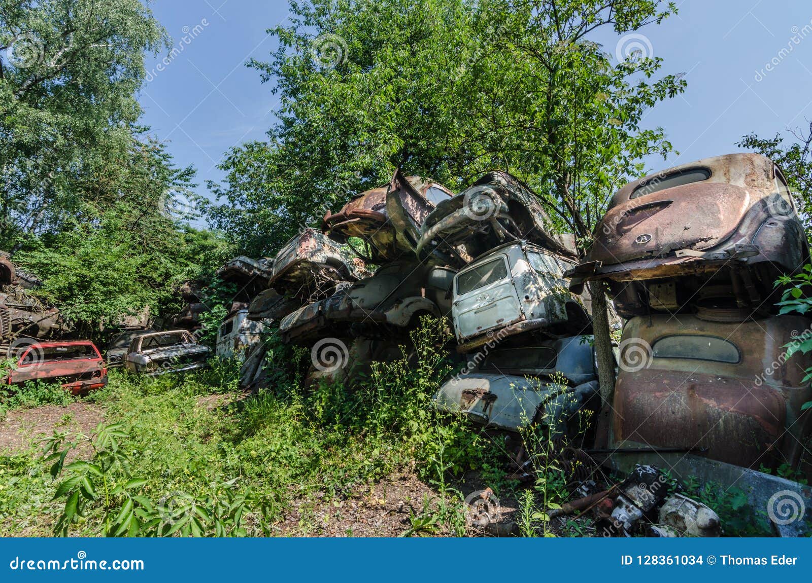 High Stacked Cars in a Warehouse Stock Photo - Image of bikes, engine ...