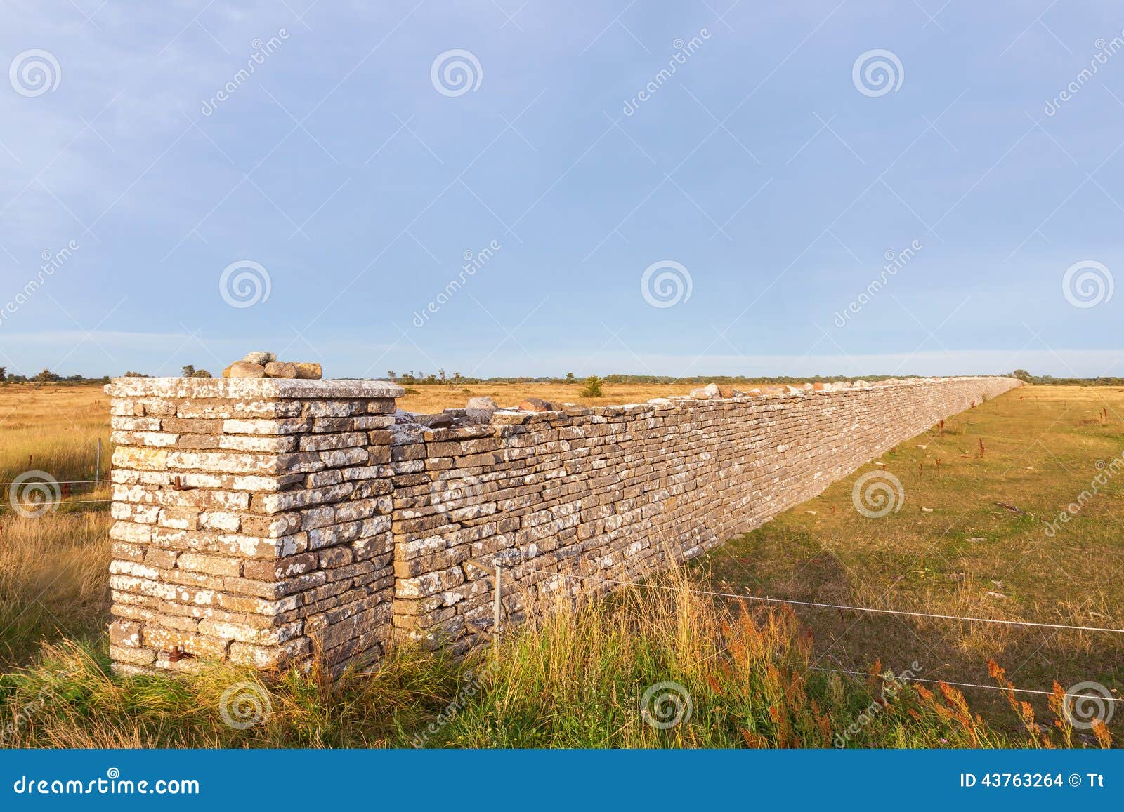 High stone wall stock photo. Image of stonewall, side - 43763264