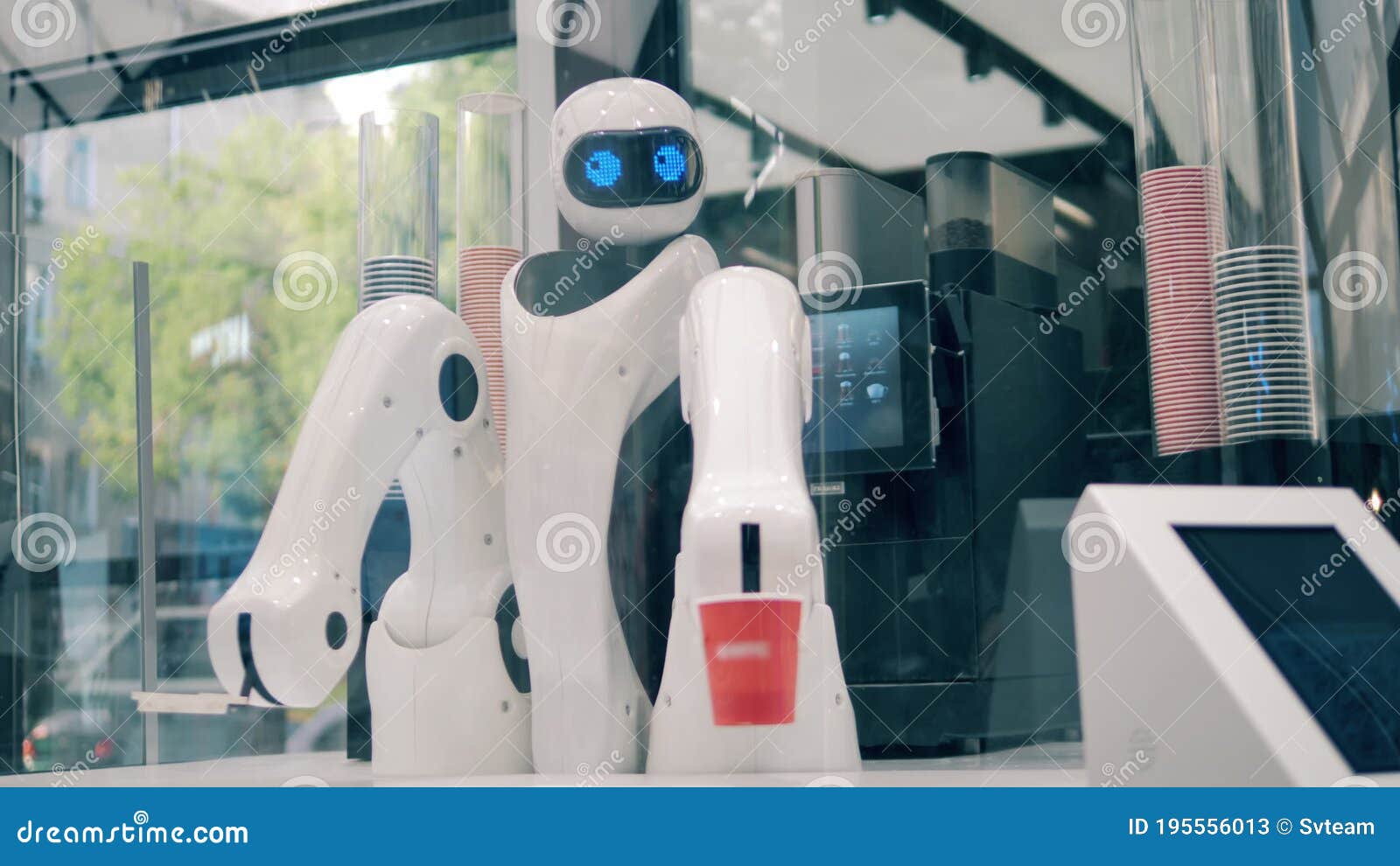 High-tech Droid is Serving a Cup of Coffee in a Cafe. Innovation ...