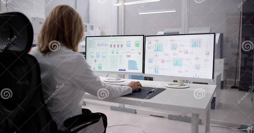 High-Tech Office: Engineer Analyzing Software Data Stock Photo - Image ...