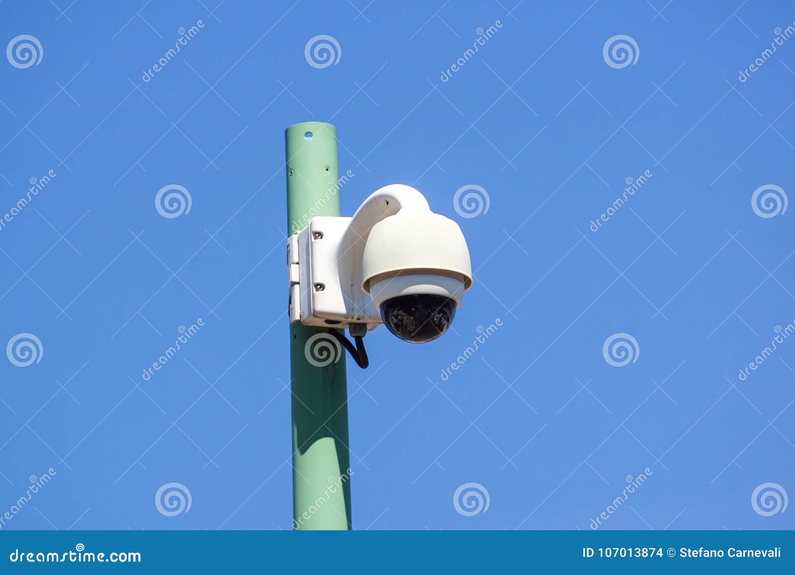High Tech Overhead Security Camera with a Blue Sky Stock Photo - Image ...