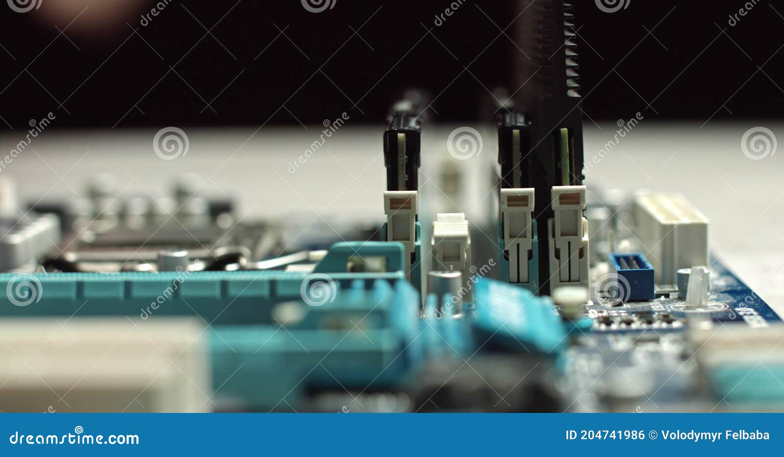 High Tech. the Process of Installing RAM on a Computer Motherboard ...