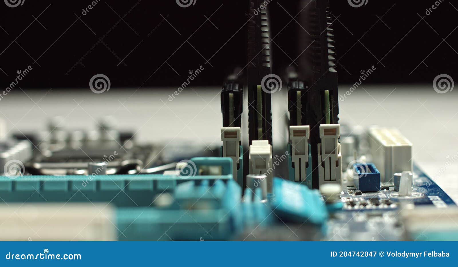 High Tech. the Process of Installing RAM on a Computer Motherboard ...