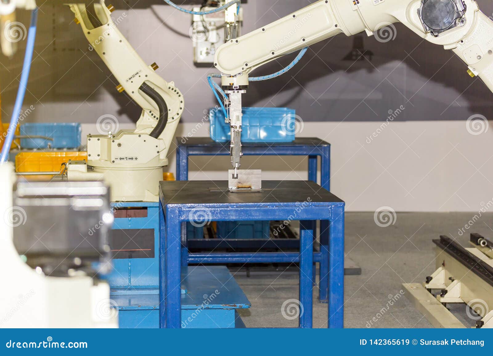 High Technology and Precision Robot Arm with Grip during Catch Welding ... High Technology and Precision Robot Arm with Grip during Catch Welding ...