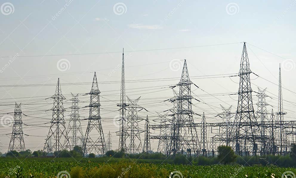 High tension wire polls stock photo. Image of electric - 20861698
