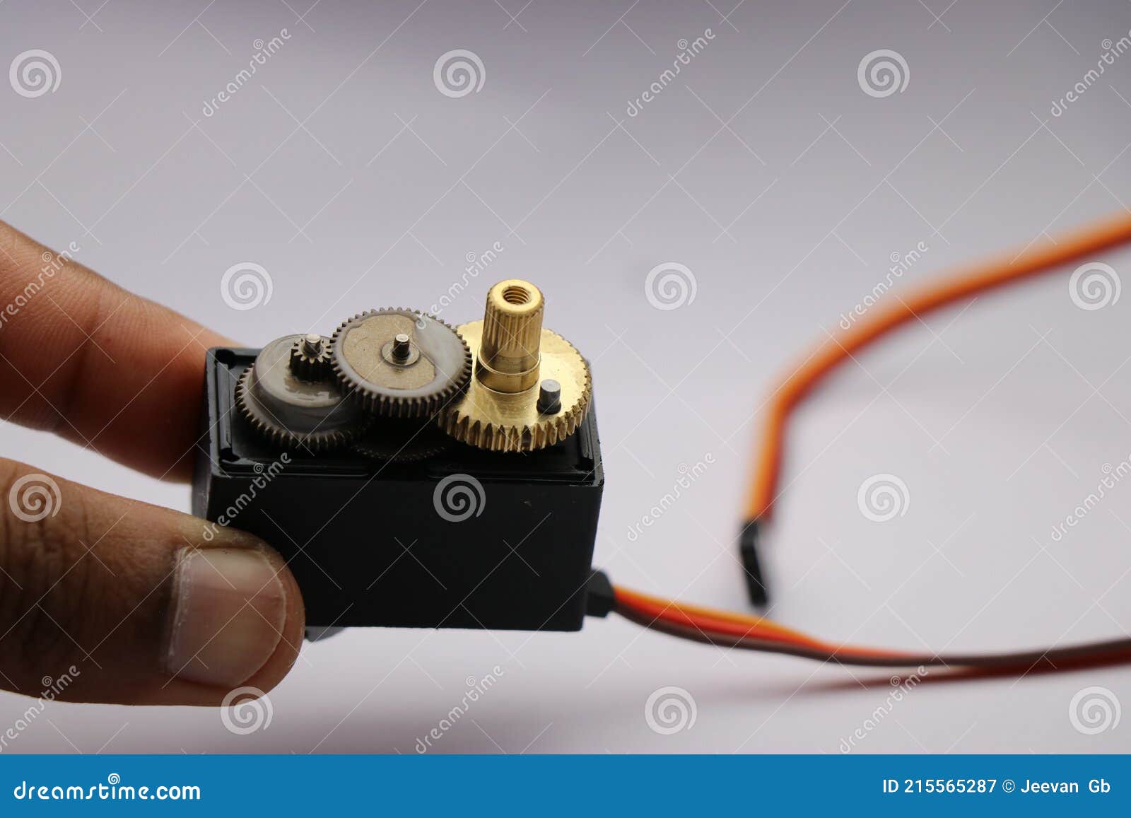 High Torque Metal Geared Servo with Close-up of Gears Held in Hand ...