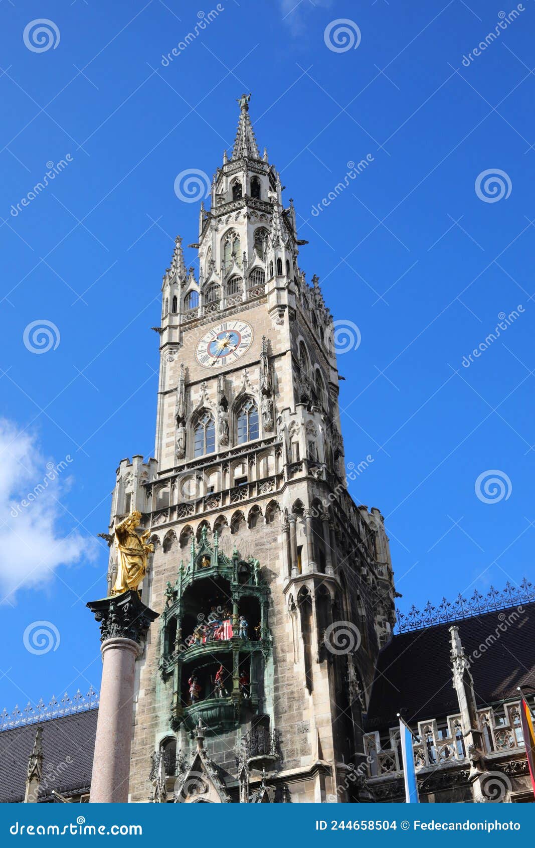 High Tower with Clock of the Munich Town Hall in Germany and the Stock ...