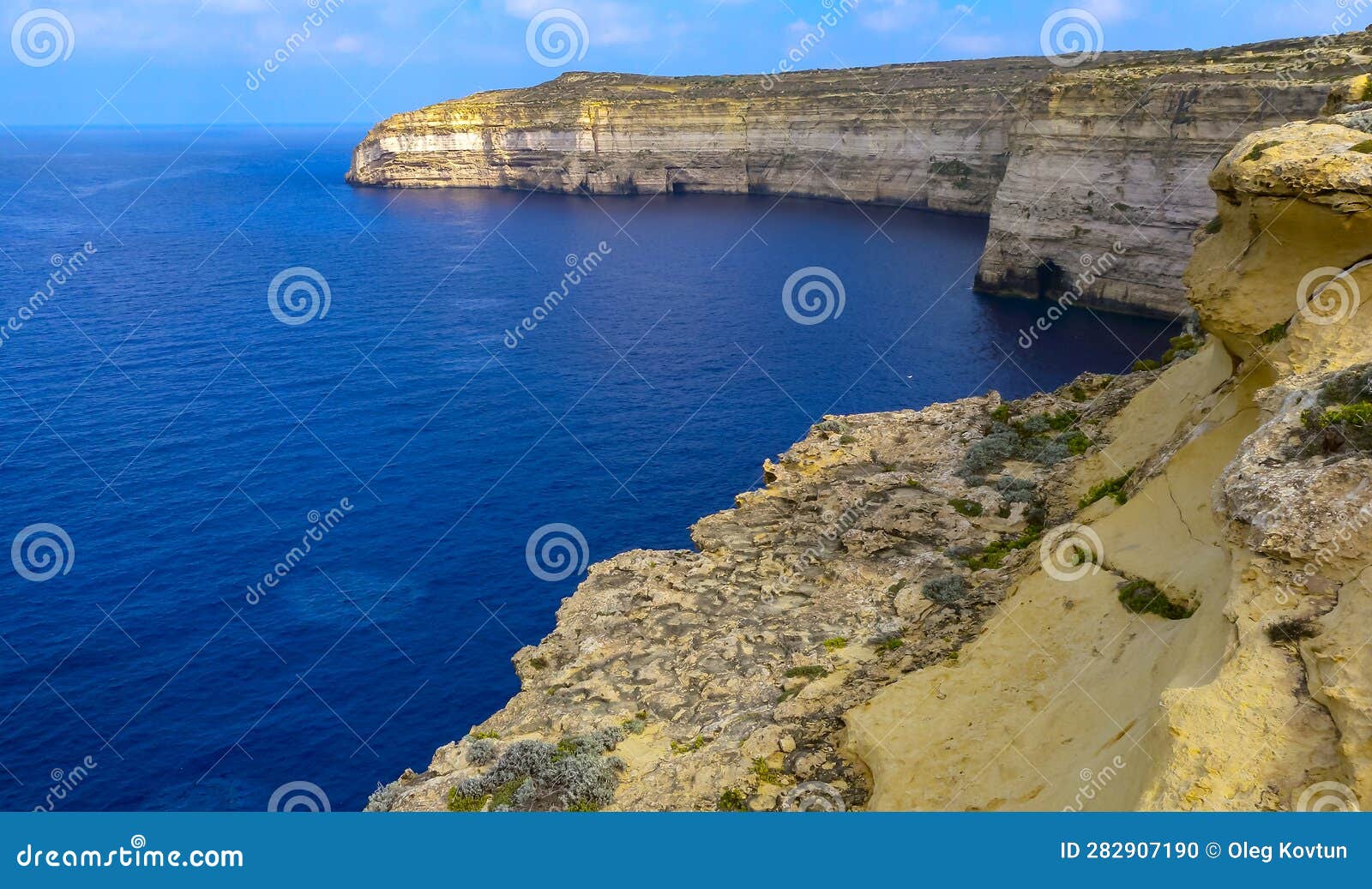 High Vertical Rocky Shore on the Island of Gozo, Malta Stock Photo ...