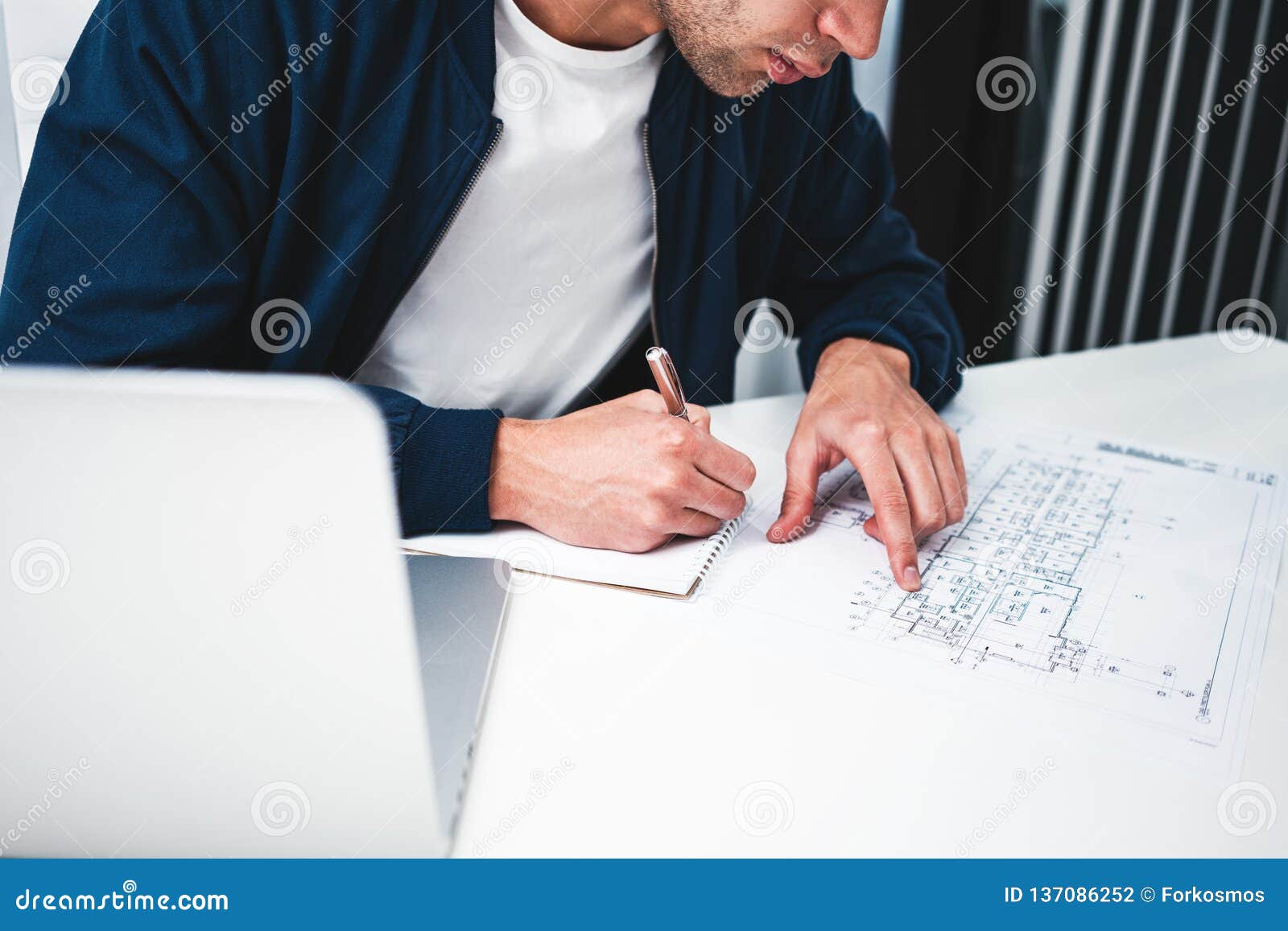 High View of Hand Hold Notepad of Businessman while Working at Office ...