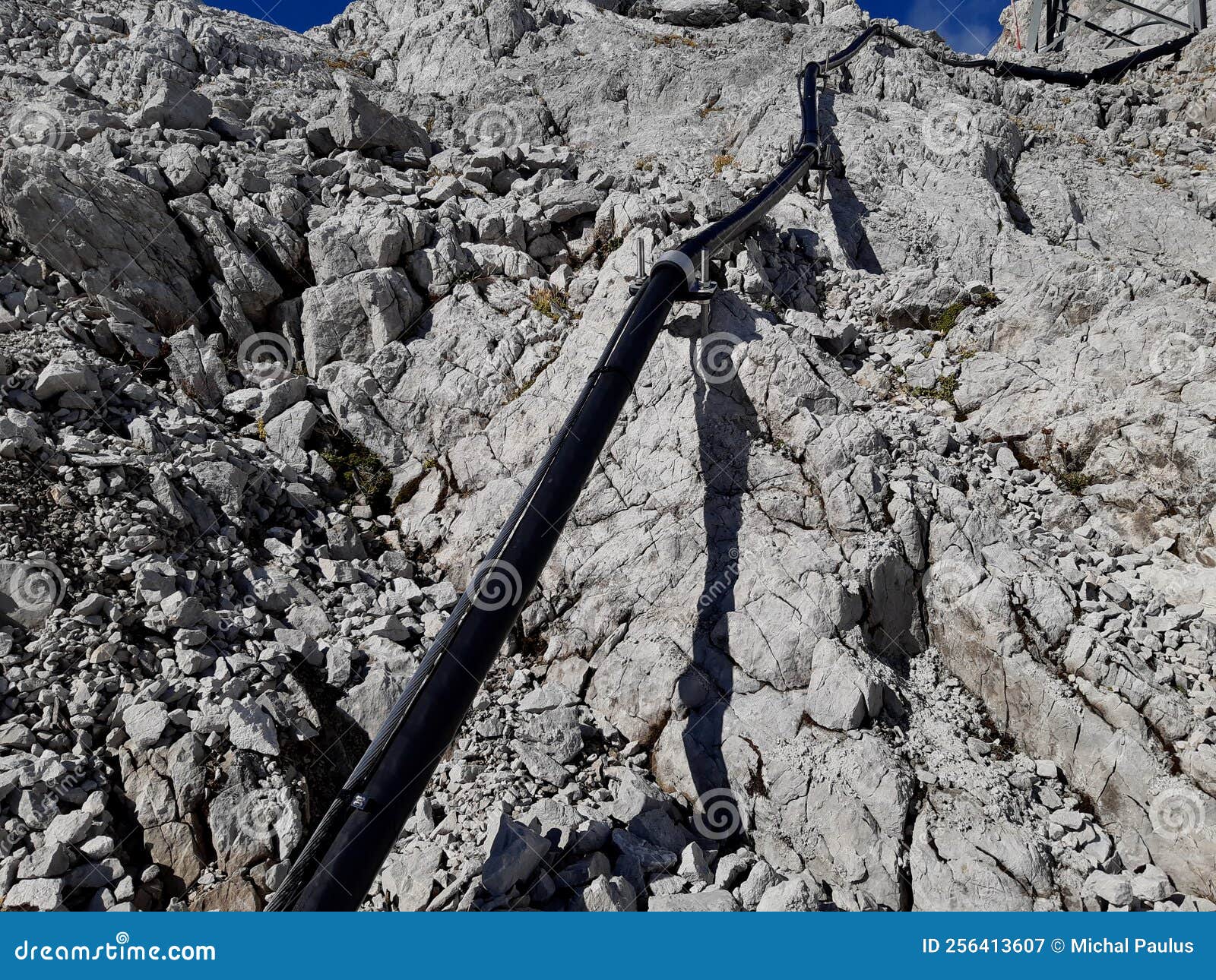 The High Voltage Cable is Attached To the Limestone Rock Using Stock ...