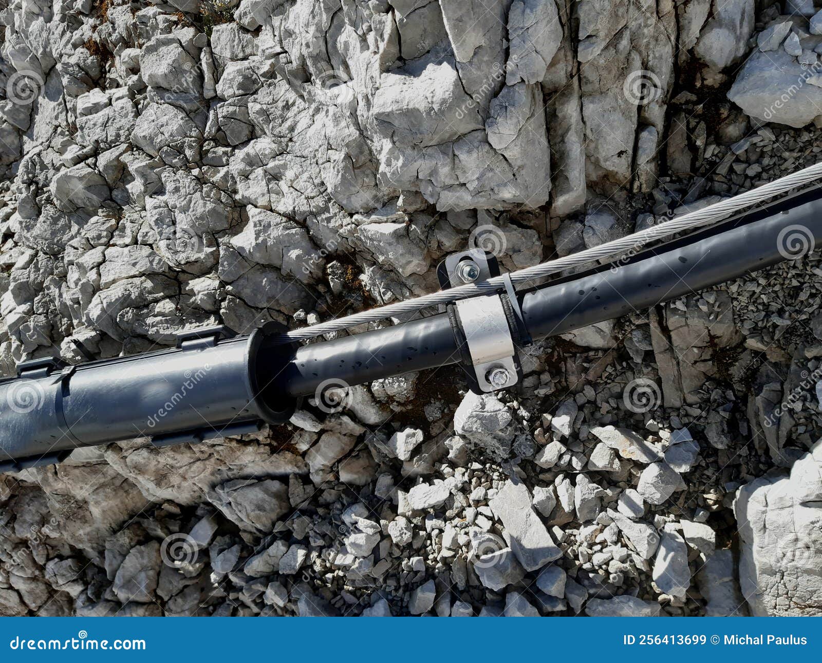 The High Voltage Cable is Attached To the Limestone Rock Using Stock ...