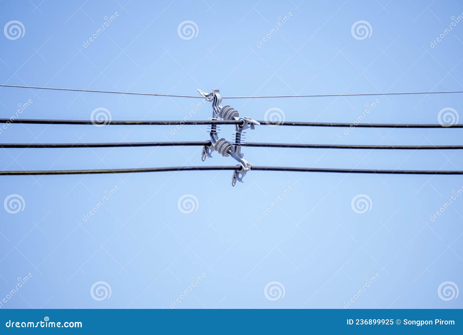 High Voltage Cable Spacer on Blue Sky Stock Image - Image of high ...