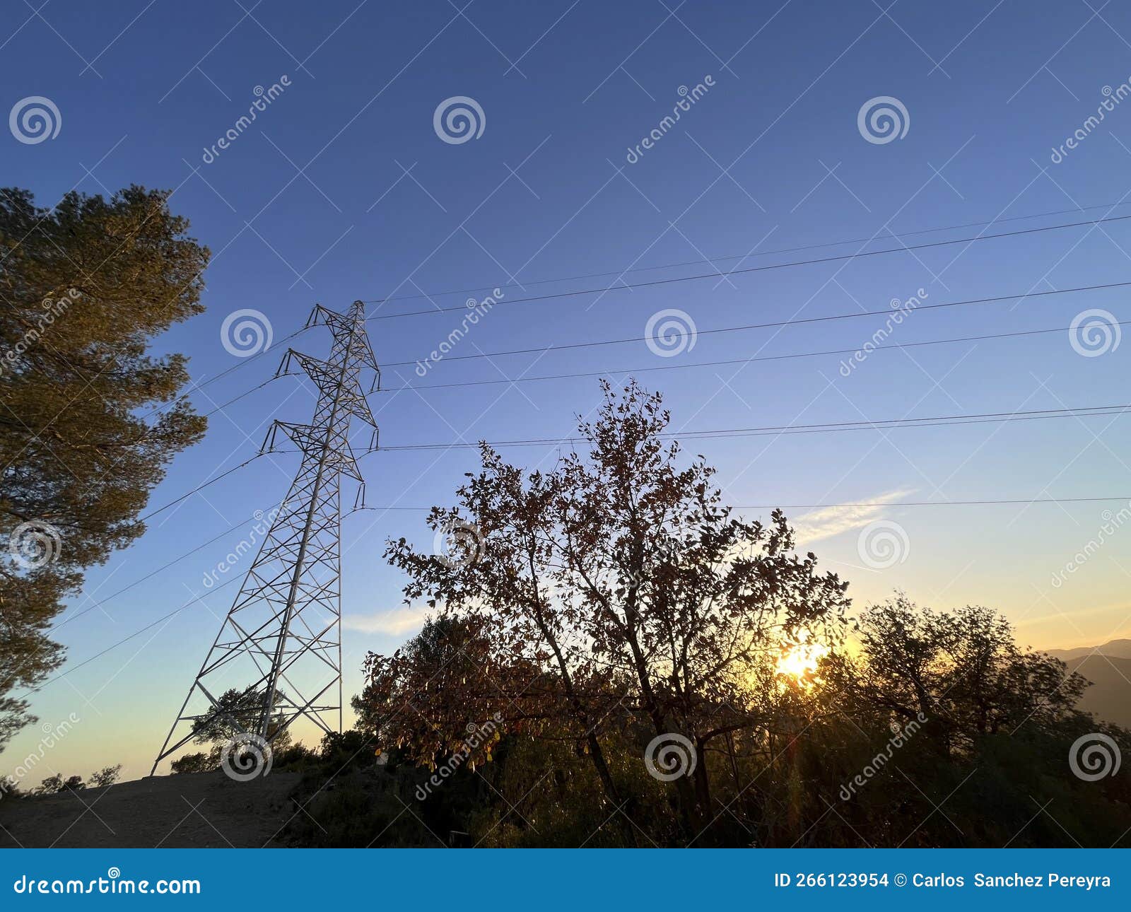 High Voltage Cable Tower during Sunset Stock Photo - Image of ...