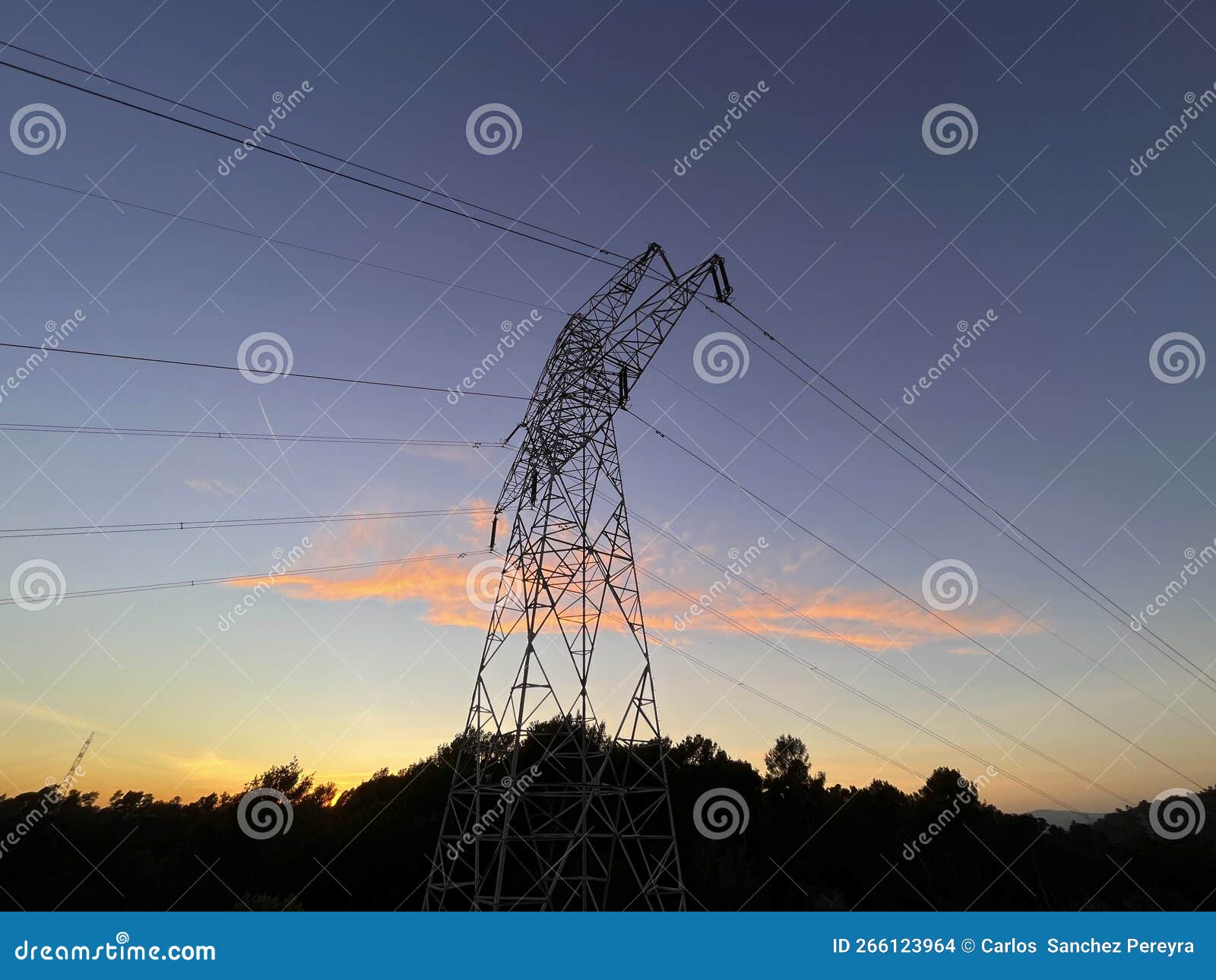 High Voltage Cable Tower during Sunset on a Mountain Stock Photo ...