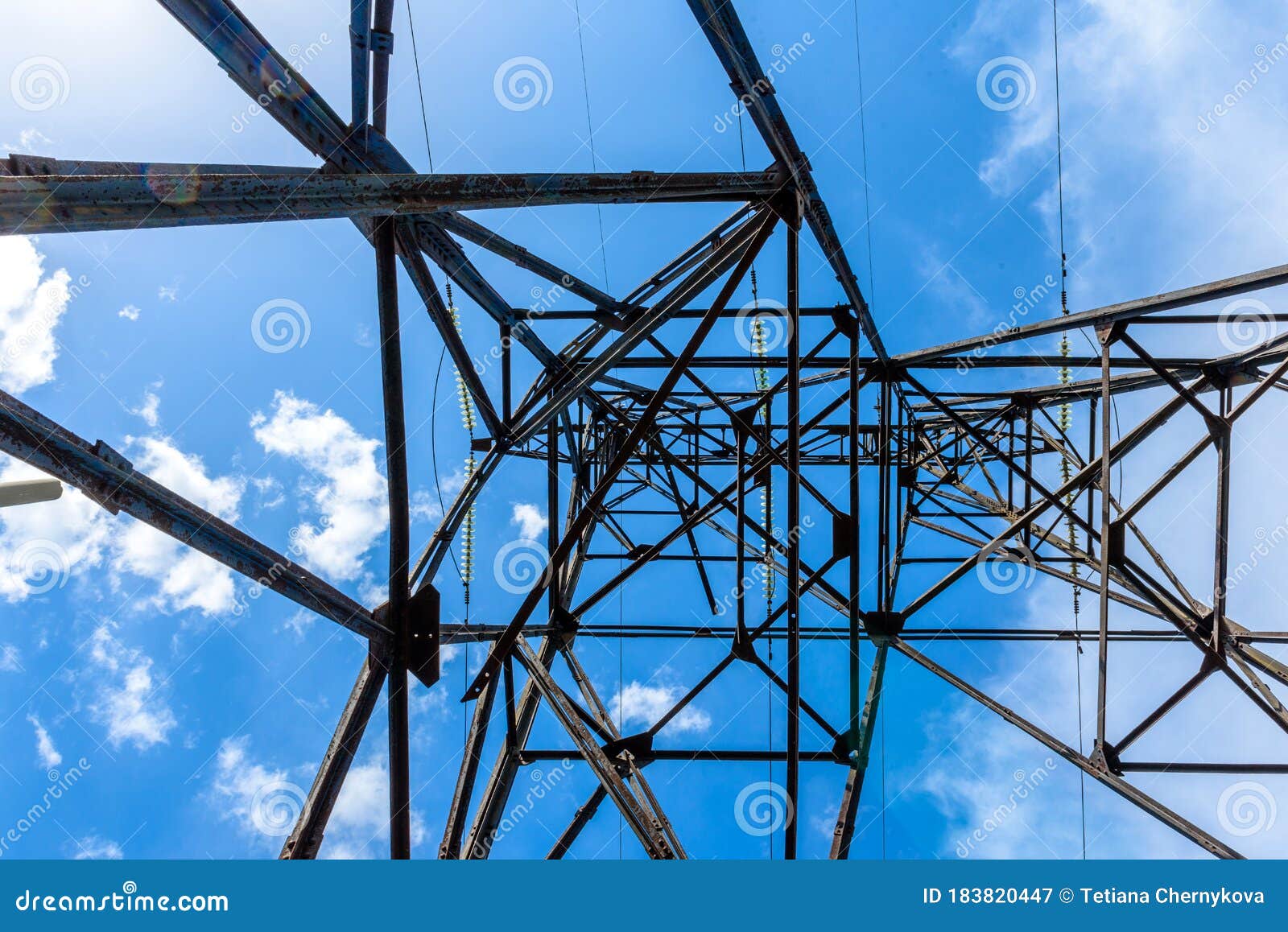 High Voltage Electric Pillar from Under. a High-voltage Electricity ...
