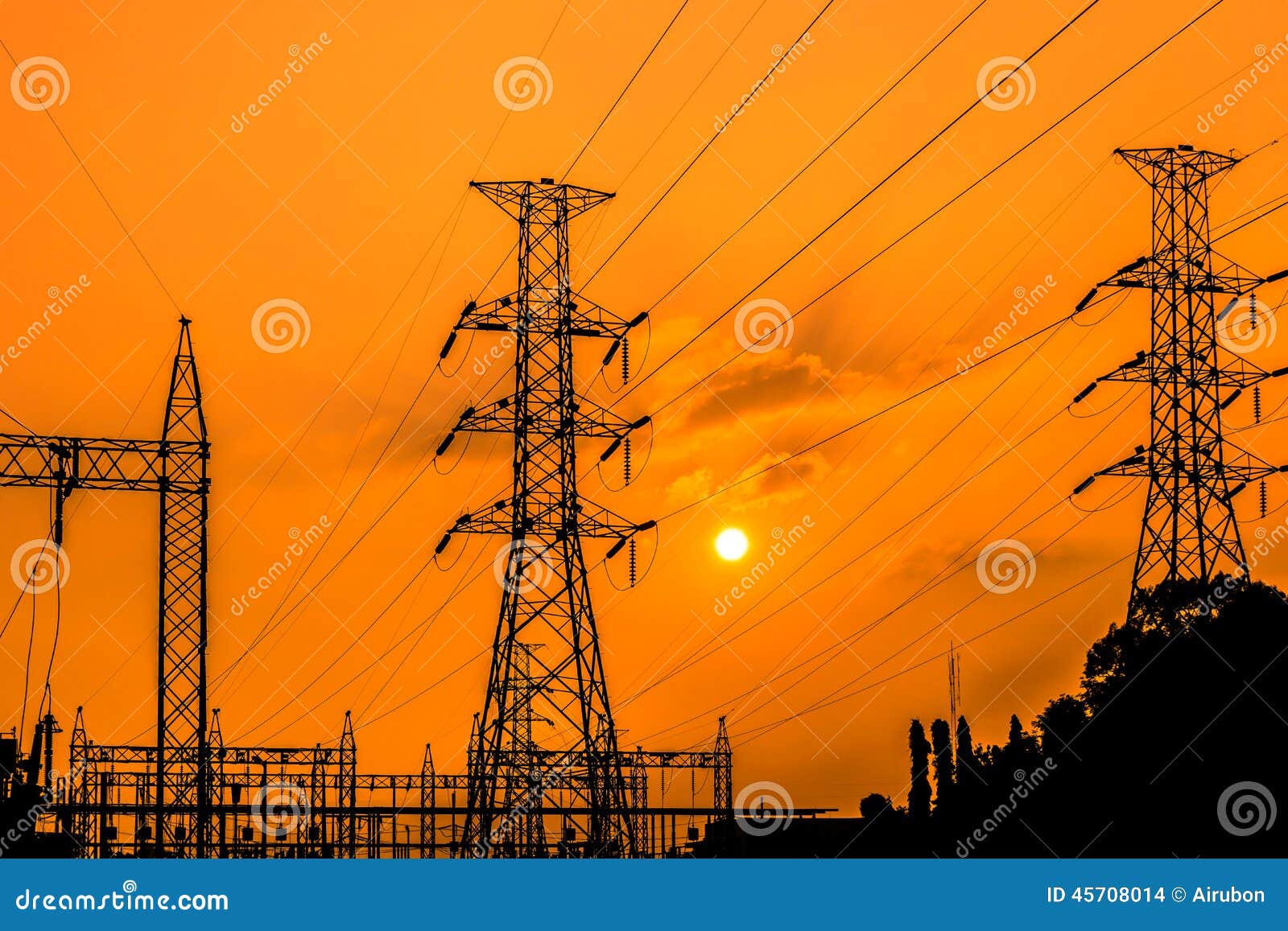 High Voltage Electric Pillars on Sunset Background Stock Photo - Image ...