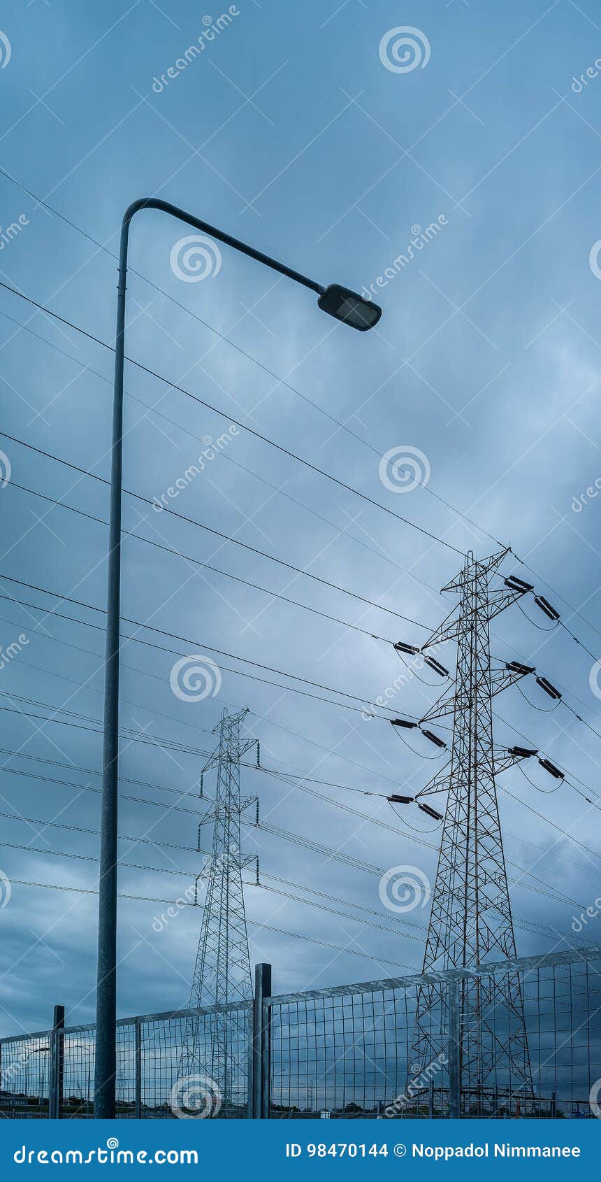 High Voltage Electric Pole in Rain Storm Stock Photo - Image of ...