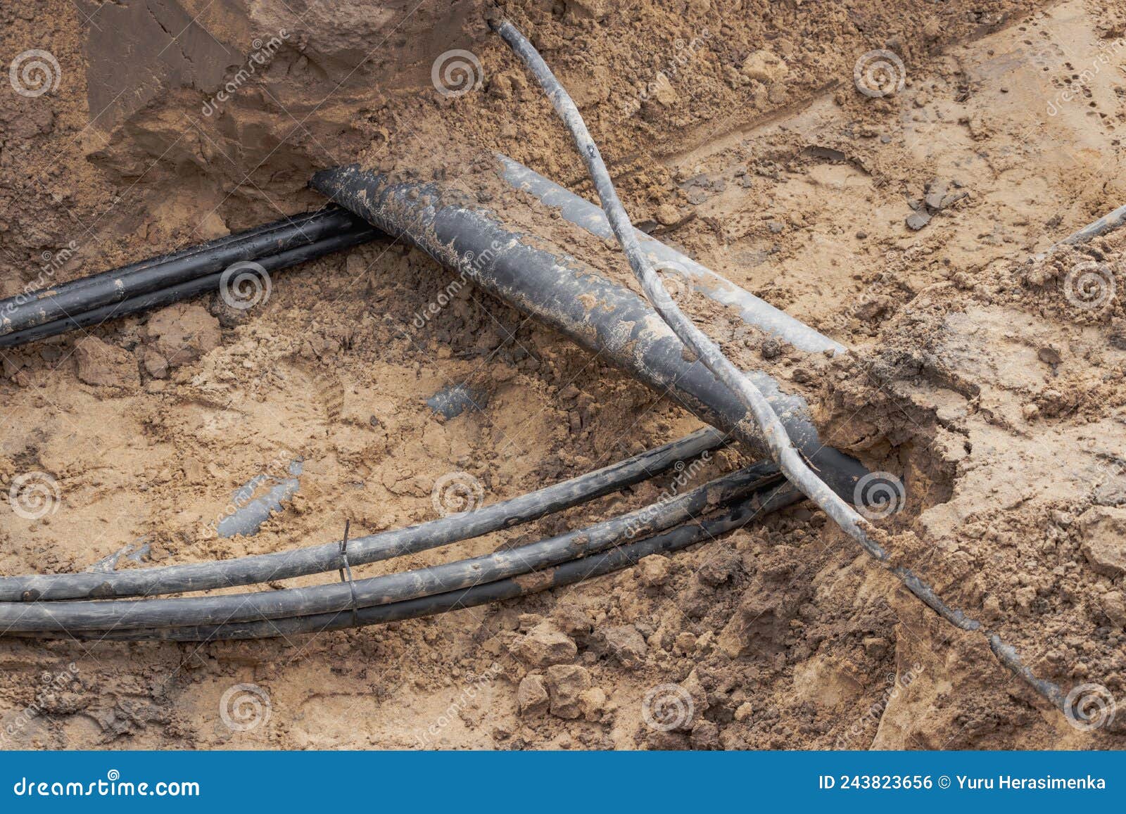 The High Voltage Electrical Cable is Laid in a Trench Under Existing ...