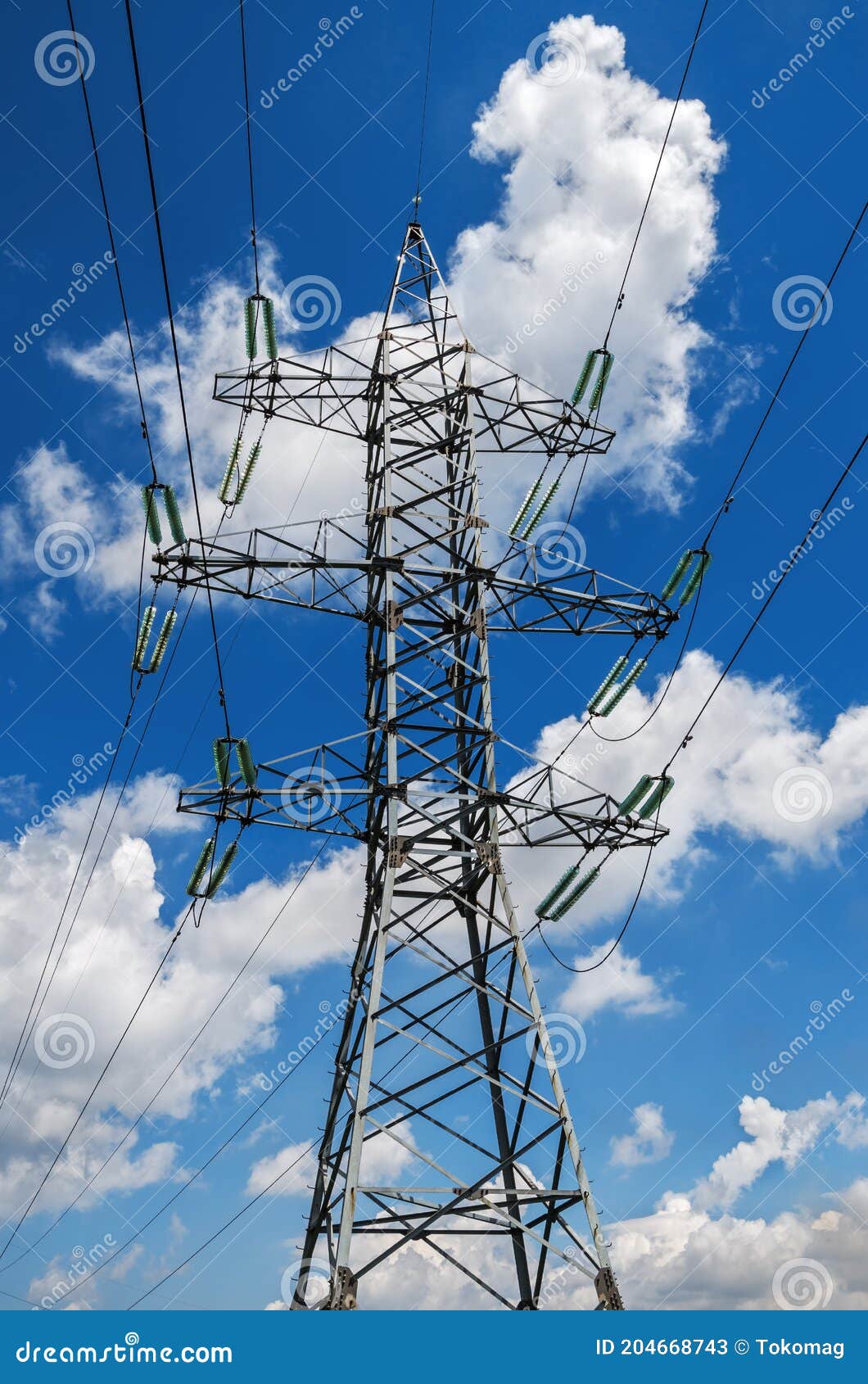 High Voltage Electrical Support on Cloudy Blue Sky Background Stock ...