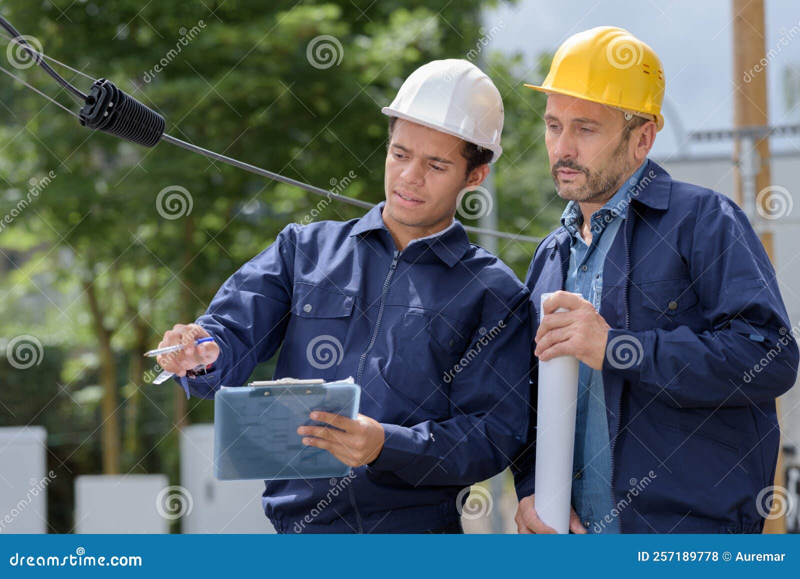 High Voltage Electrical Technicians at Work Stock Photo - Image of ...