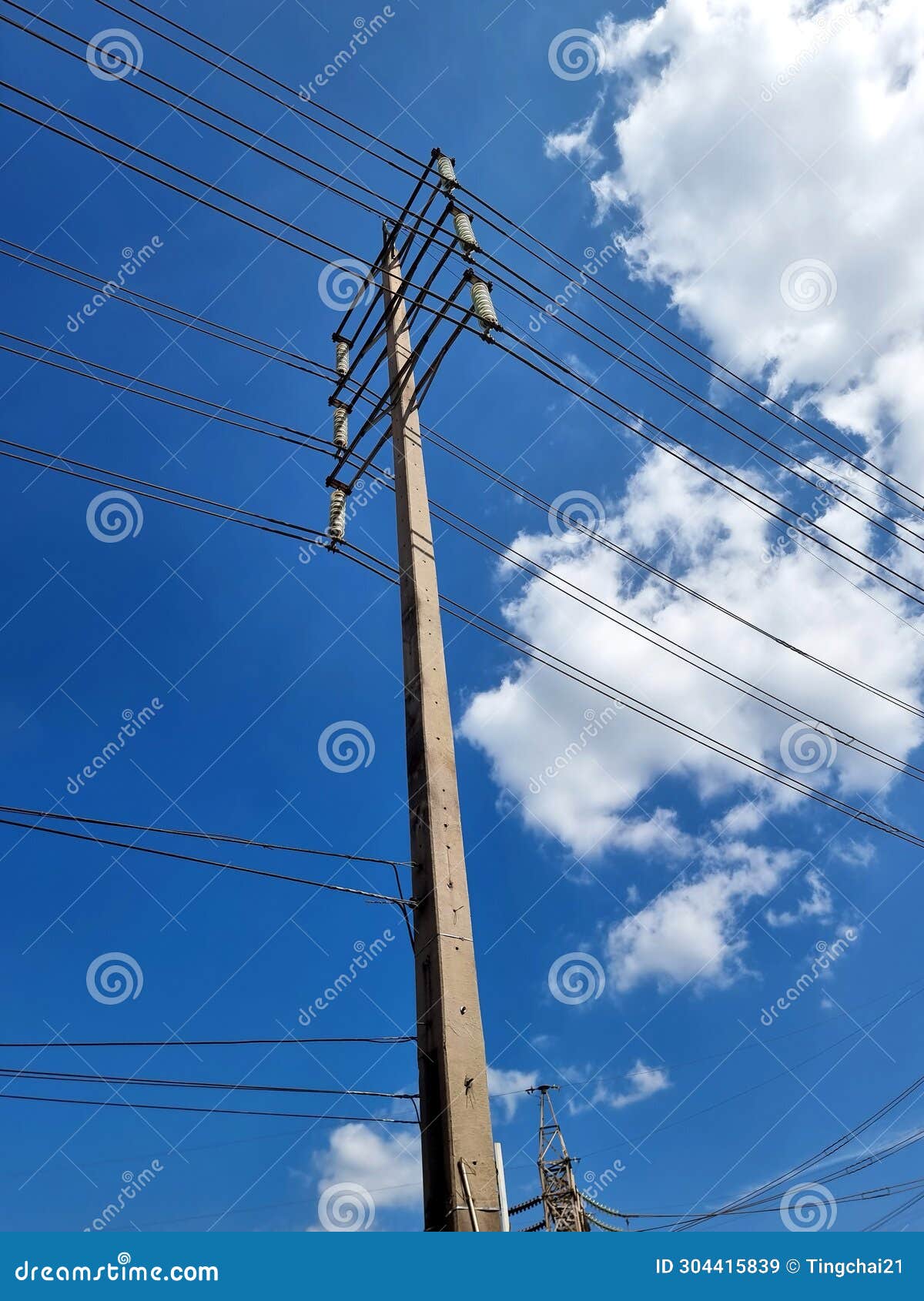 High-Voltage Electrical Transmission Line on Clouds in the Blue Sky ... High-Voltage Electrical Transmission Line on Clouds in the Blue Sky ...