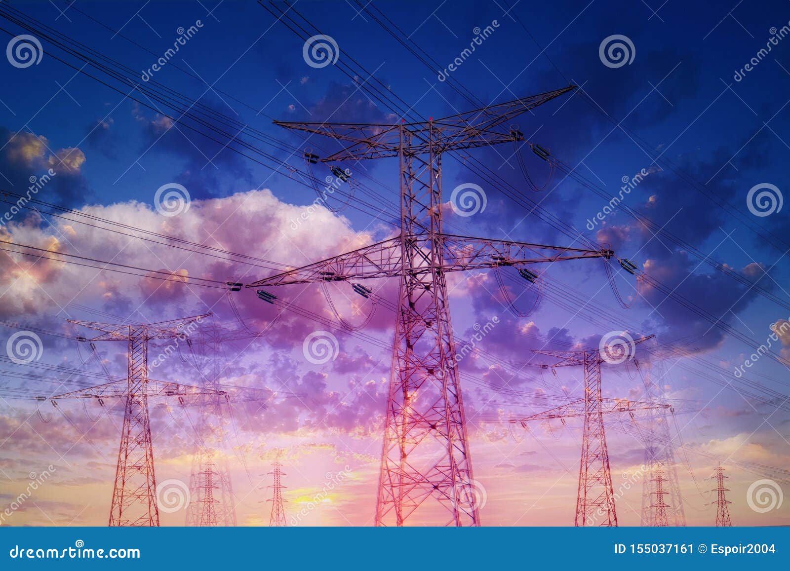High Voltage Electrical Wire Towers Against a Dramatic Sky Stock Image ...