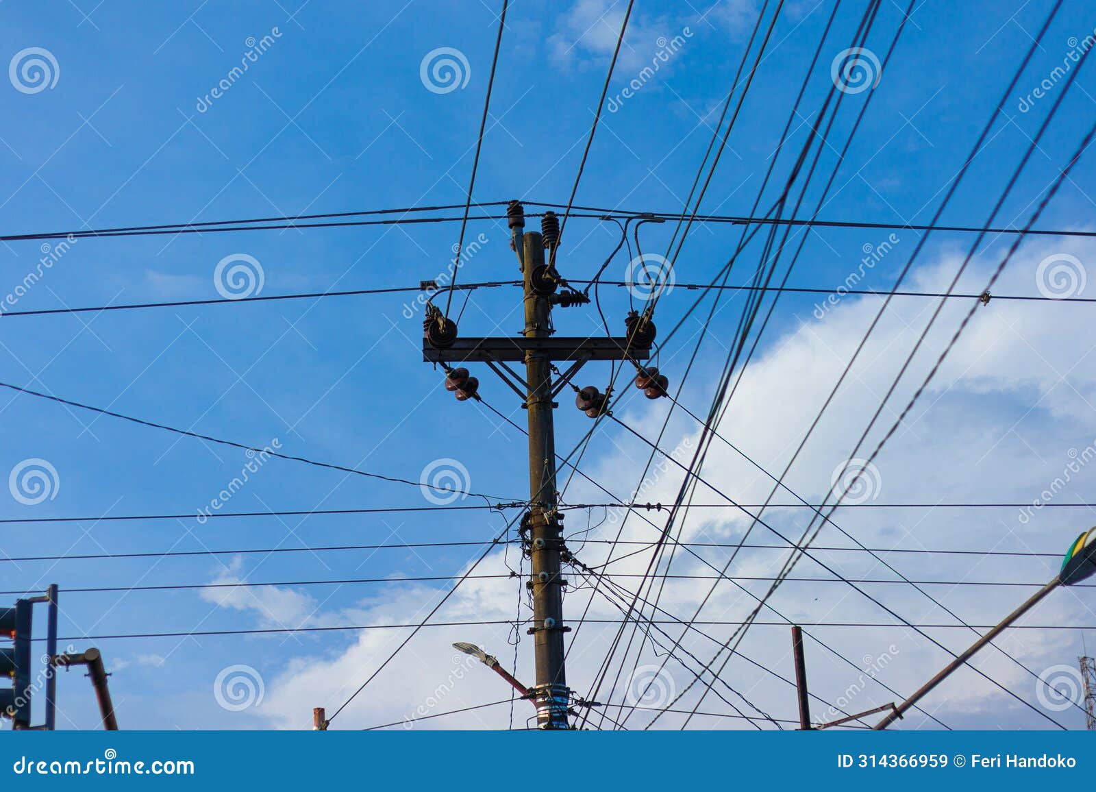 A High Voltage Electricity Pole with Many Wires Running Across it Stock ...