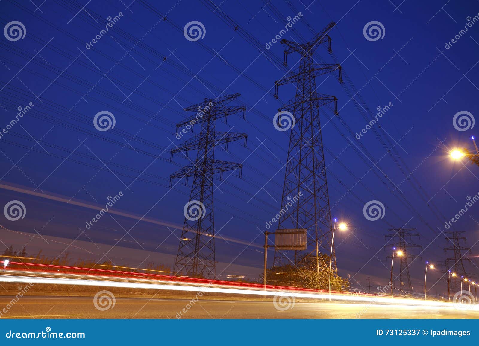 The High Voltage Electricity Pylon in Side of Highway Stock Image ...