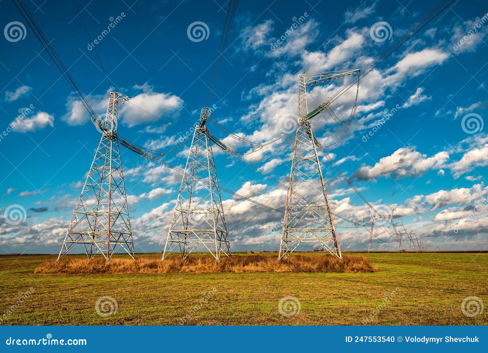 High Voltage Electricity Tower in Spring Field Stock Photo - Image of ...