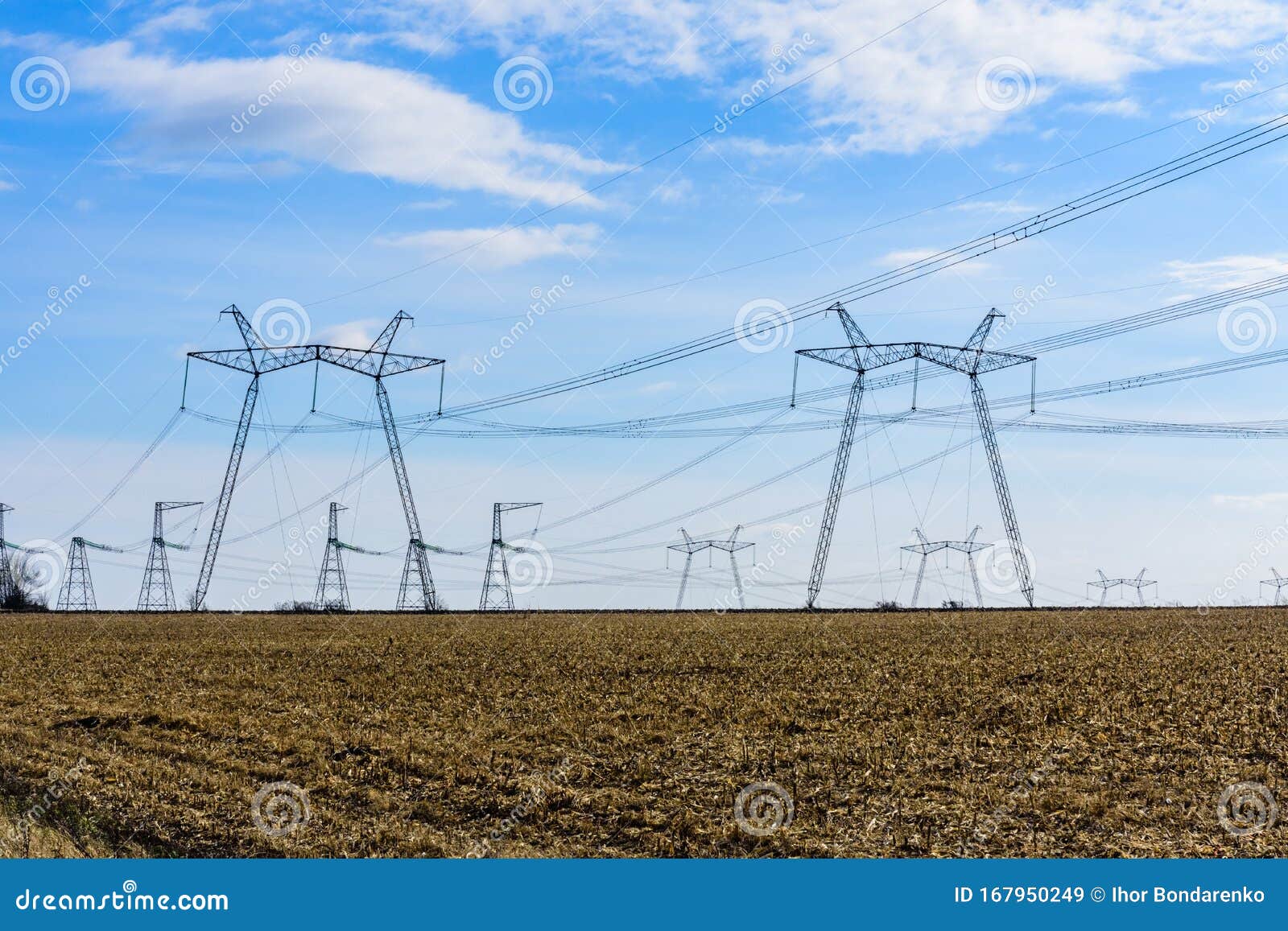 High Voltage Power Line in a Field on Autumn Stock Image - Image of ...