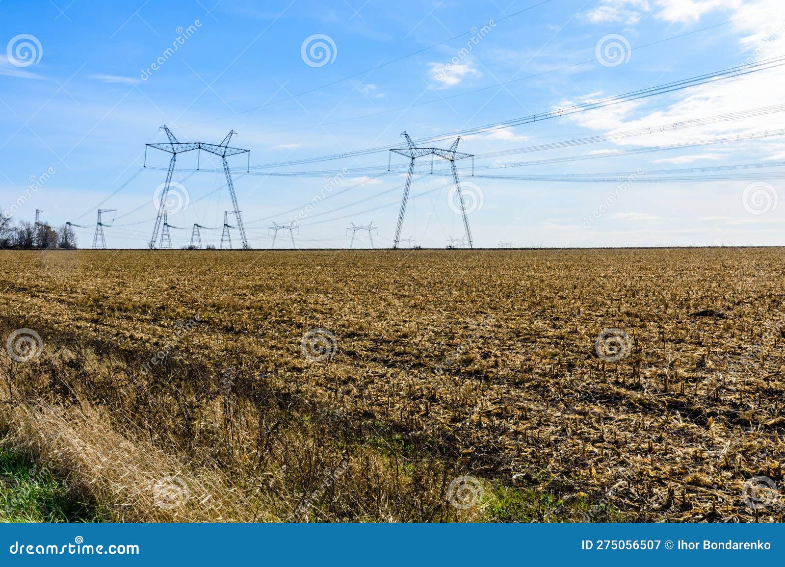 High Voltage Power Line in a Field on Autumn Stock Image - Image of ...