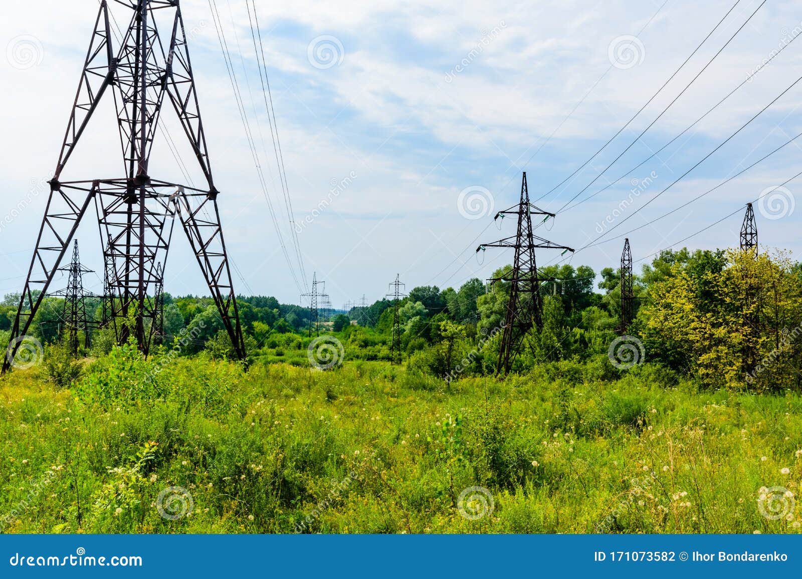 High Voltage Power Line in Forest Stock Photo - Image of communication ...