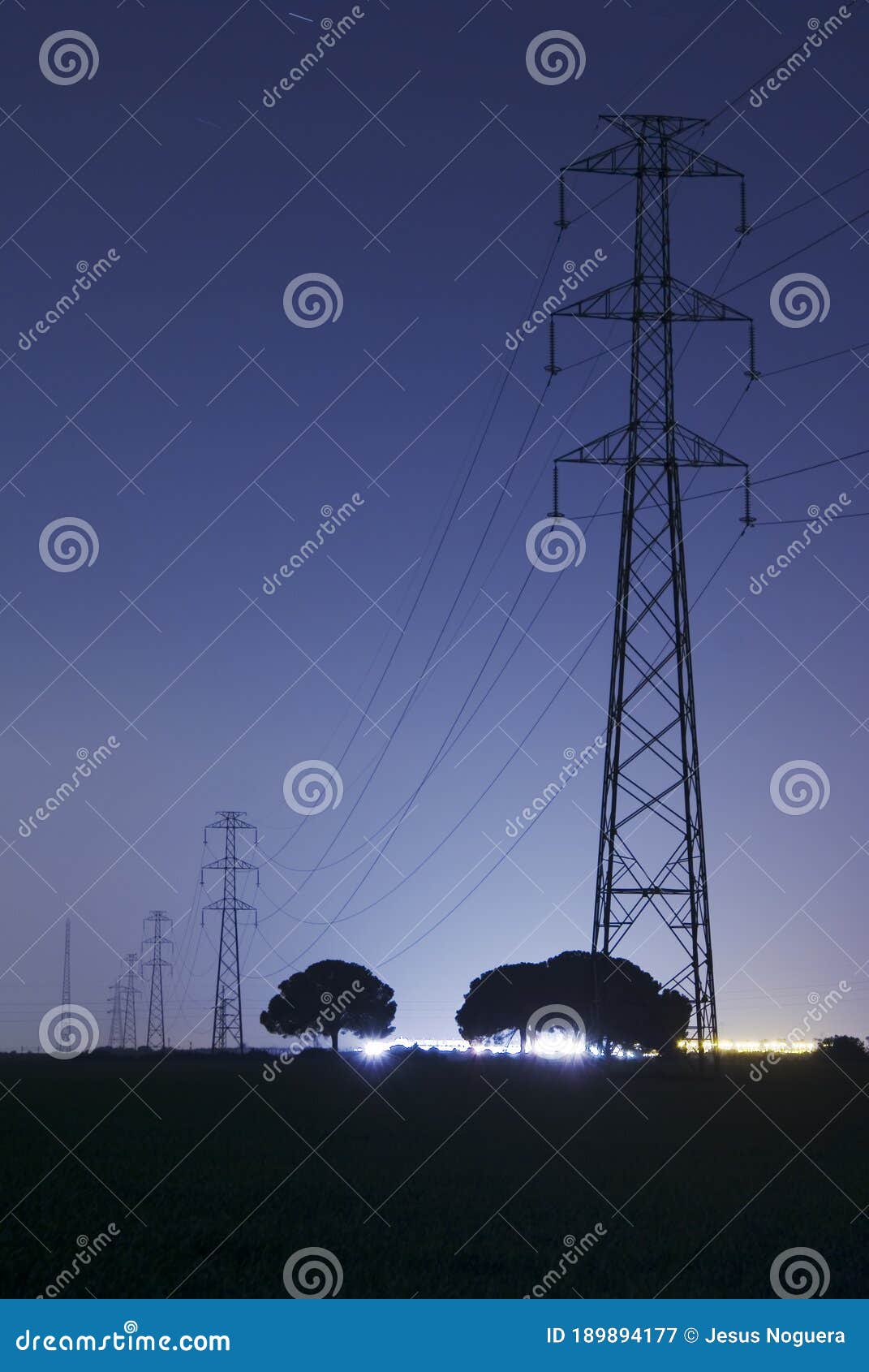 High Voltage Power Line at Night in Seville. Spain Stock Image - Image ...