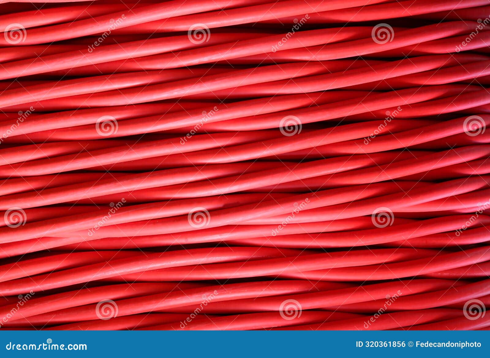 High Voltage Power Line with Red Insulated Cable Against a Background ...