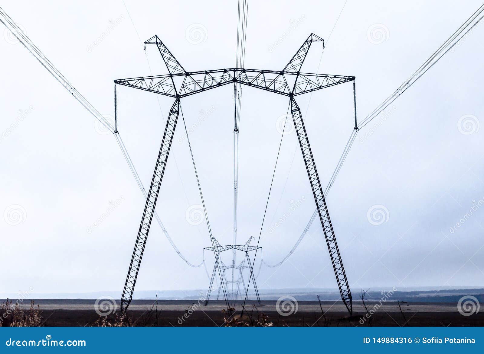 High Voltage Power Lines in Perspective Stock Photo - Image of poles ...
