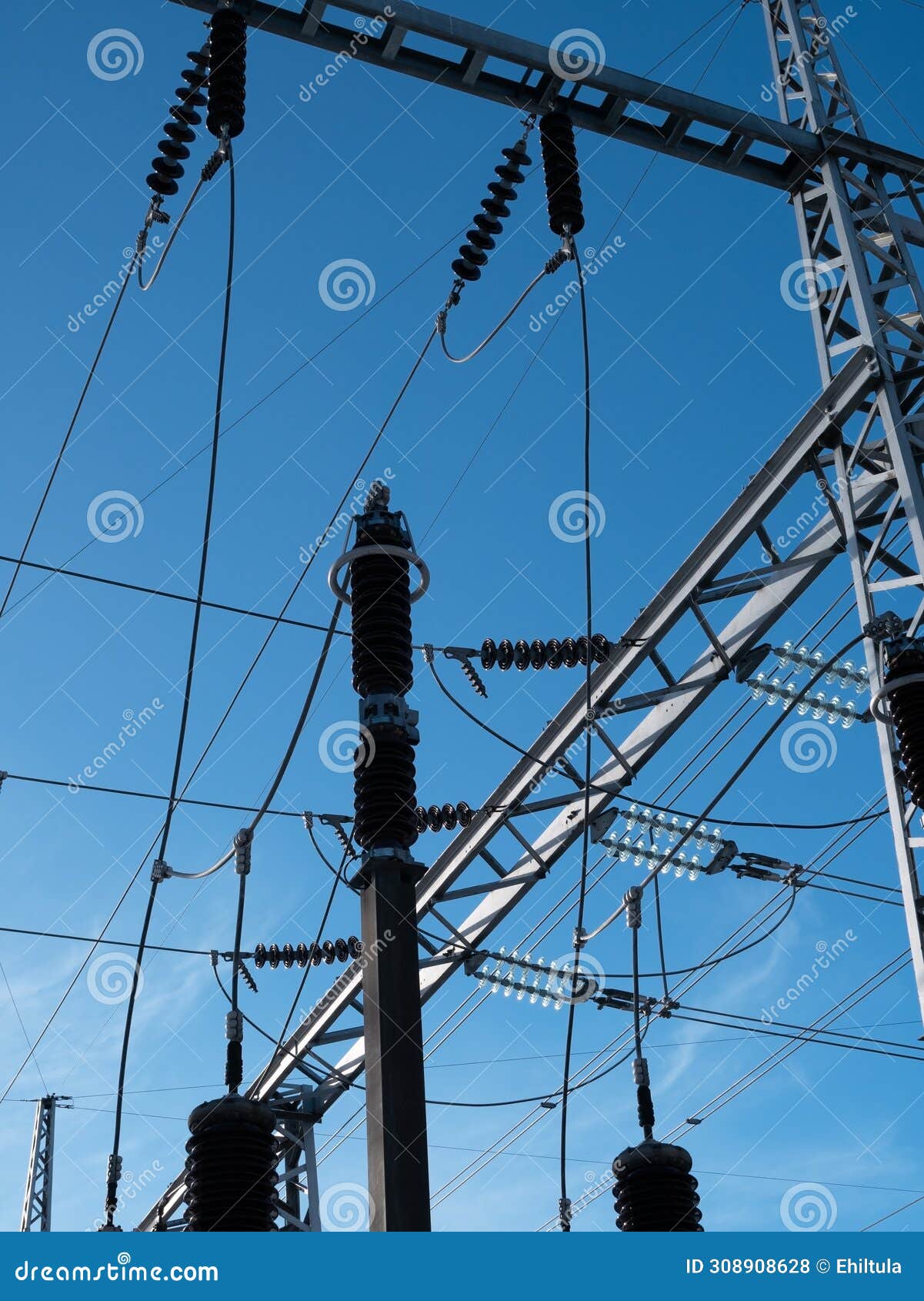High-voltage Power Lines of Transformer Substation Against the Blue Sky ...