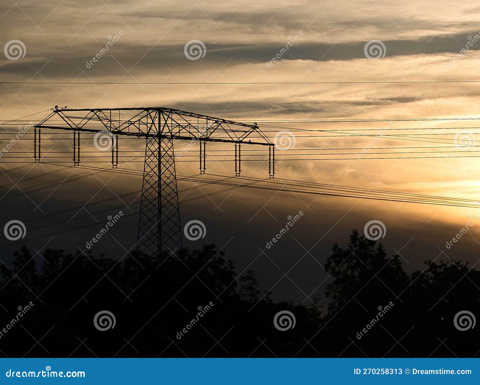 Electricity Is Transported By Thick Cables Attached To Metal Towers ...